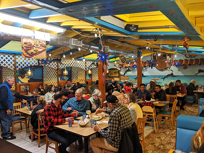 The dining room buzzes with the universal language of good food&mdash;forks pausing mid-air, heads nodding in approval, and the occasional food-joy moan.