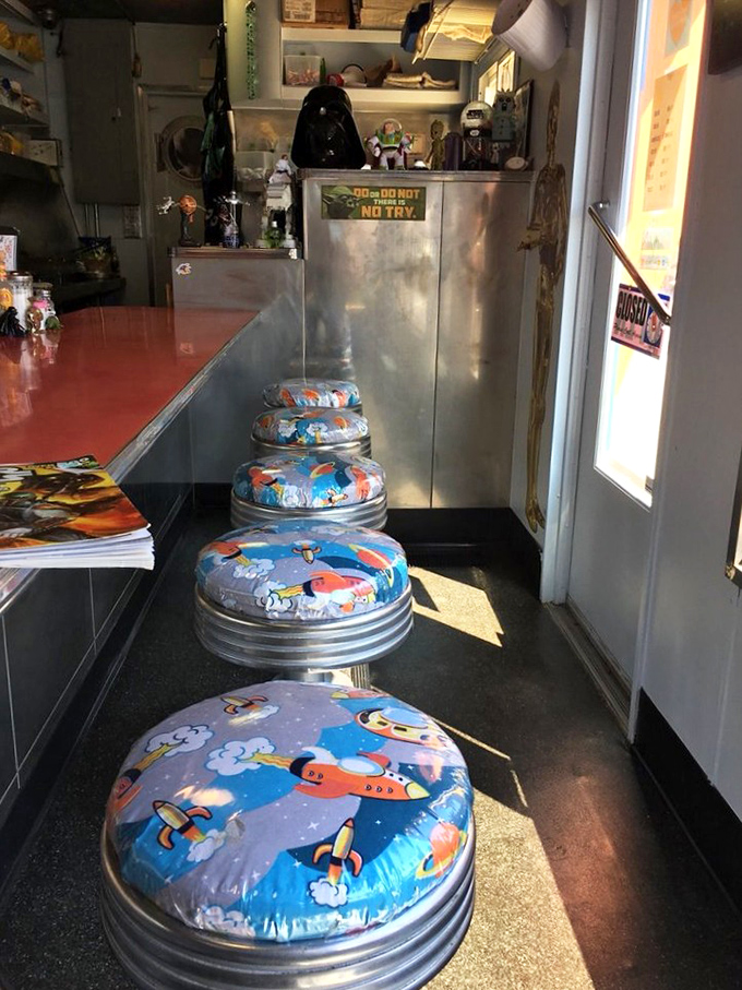 These whimsical rocket-themed stools aren't just seating&mdash;they're your personal transport pods to flavor town, lined up and ready for boarding.