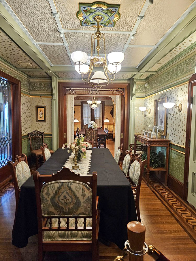 The formal dining room looks deceptively normal – until you realize it took guests three wrong turns and a secret passage to find their dinner.