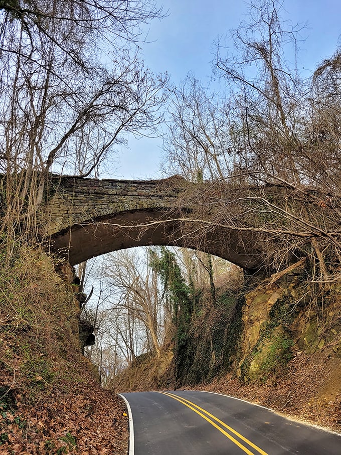 Fall foliage adds a splash of color to the bridge's weathered stone. Even ghosts must appreciate a good seasonal makeover.