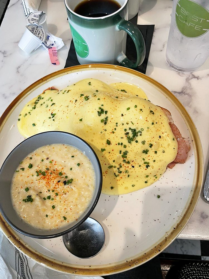 Eggs Benedict reimagined with a Southern drawl&mdash;hollandaise cascading over ham while cheesy grits stand by as the perfect supporting actor.