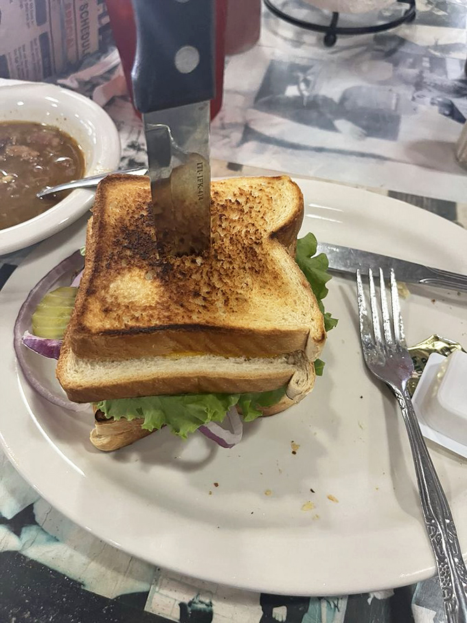 The perfect grilled sandwich, knife standing at attention as if to say, "Yes, I'm as proud of this creation as you're about to be pleased eating it."