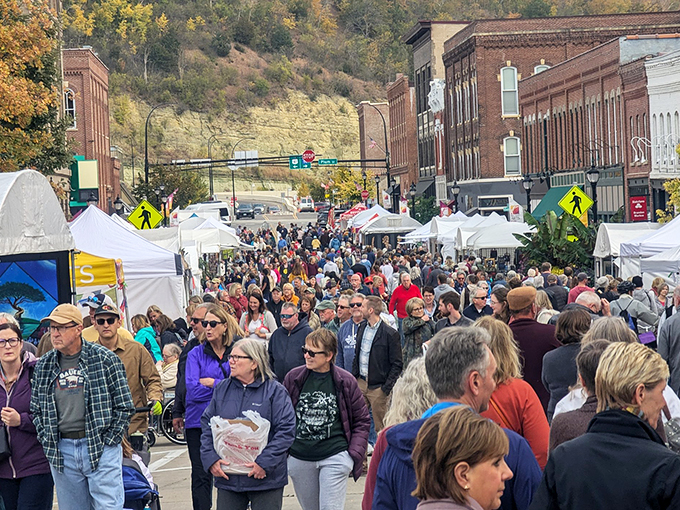 Fall festivals transform Main Street into a human river, proving small towns still know how to throw a party that draws a crowd.