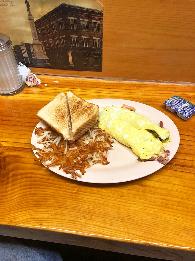 The breakfast plate that answers life's most important morning question: "Why choose between eggs, bacon, and toast when you can have it all?"