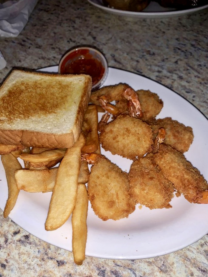 These golden-battered shrimp are what happens when seafood meets Midwestern hospitality. Crispy, tender, and impossible to stop eating.