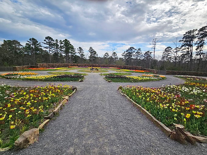 Garvan Woodland Gardens explodes with color each spring—a kaleidoscope of blooms that delivers million-dollar views for a modest entrance fee.