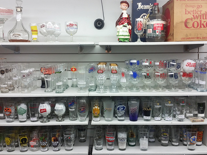The beer glass collection that chronicles America's brewing history. Each one a souvenir from someone's good time decades ago.