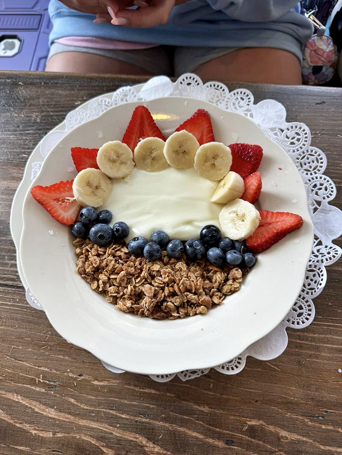 A breakfast parfait arranged with such care it could hang in the Louvre&mdash;nature's candy surrounding creamy yogurt in a morning masterpiece.