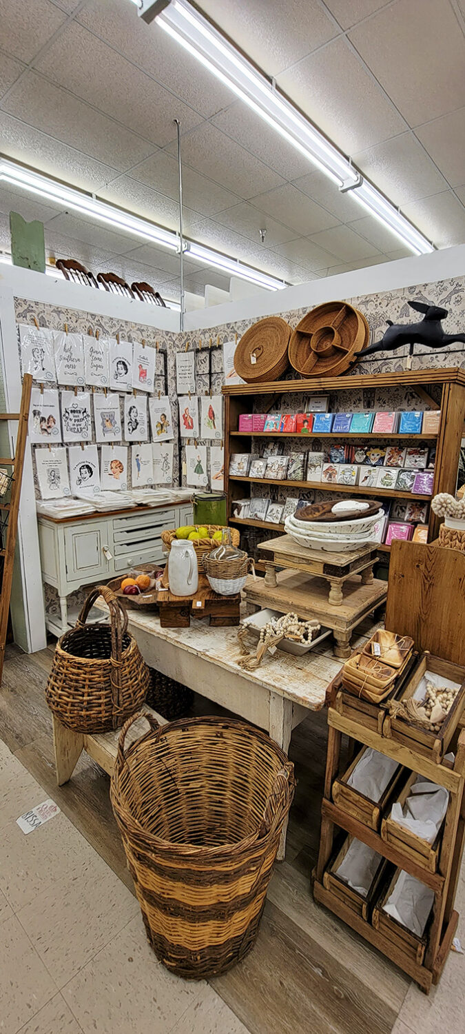 A perfectly curated corner where rustic meets refined. The wall art seems to whisper, "Yes, your home could look this charming too."