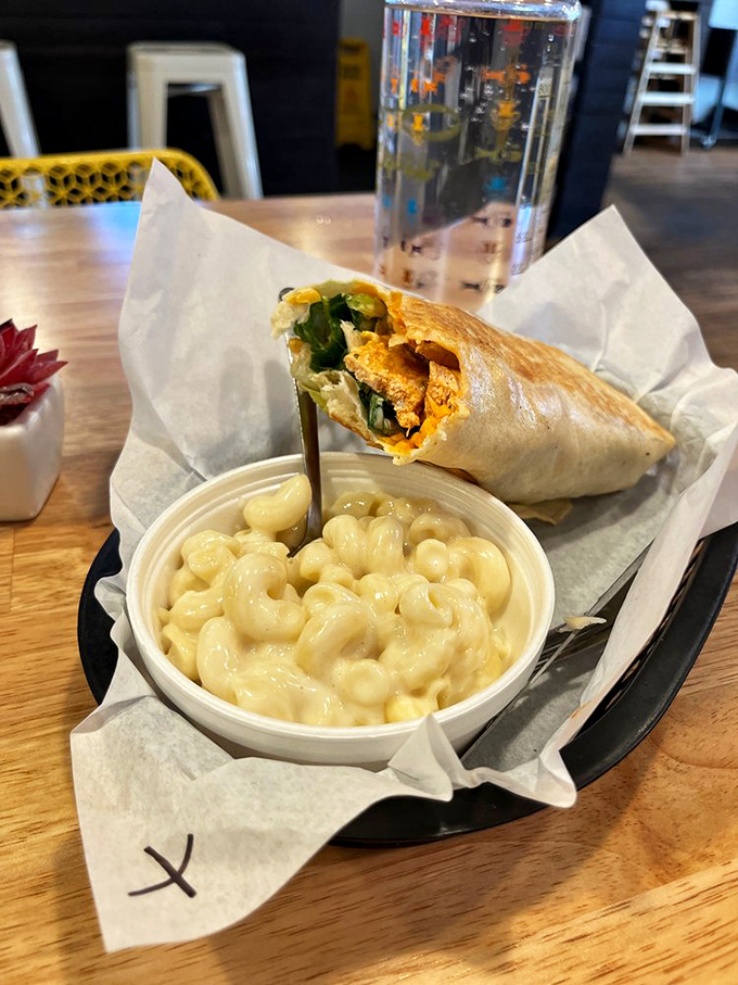 The wrap: civilization's greatest contribution to eating messy foods neatly. This one packs chicken, greens, and mac in perfect harmony.