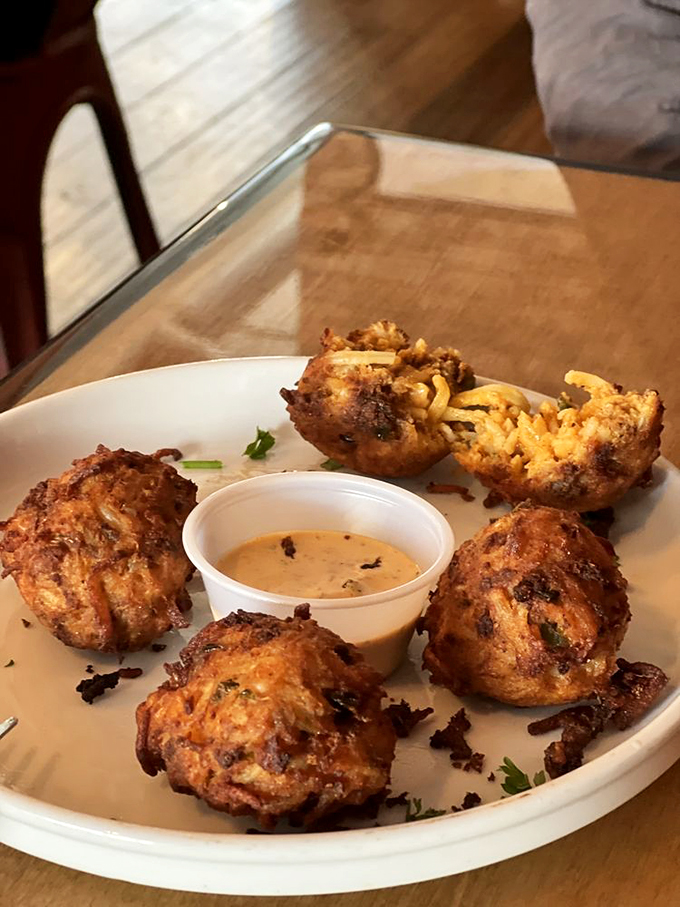 Crispy spheres of joy that put ordinary breakfast appetizers to shame. Comfort food gets a spicy upgrade worth every calorie.