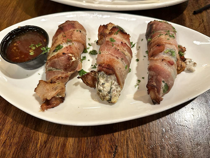 Bacon-wrapped jalape&ntilde;o poppers: where heat meets sweet meets savory in a trinity of flavors that would make St. Patrick himself convert. 