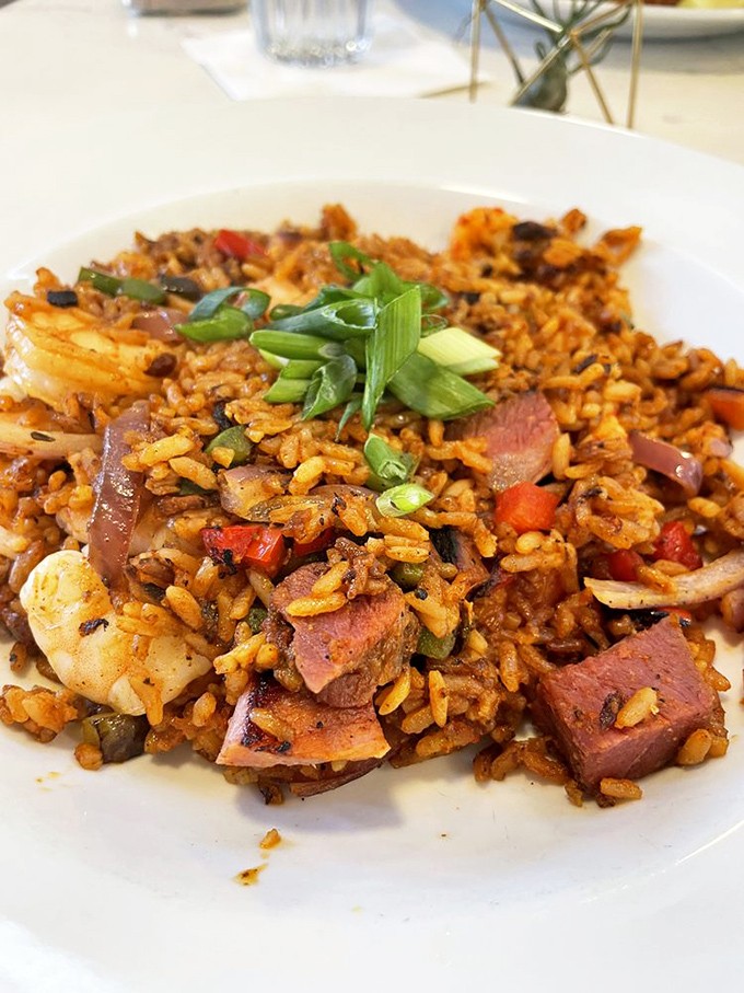 Jambalaya that makes you want to start a second stomach. Every grain of rice seems individually seasoned, with chunks of sausage and shrimp playing delicious hide-and-seek.