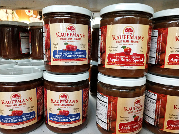 Kauffman's apple butter jars line the shelves like soldiers of sweetness, ready to transform your morning toast into something worth getting out of bed for.