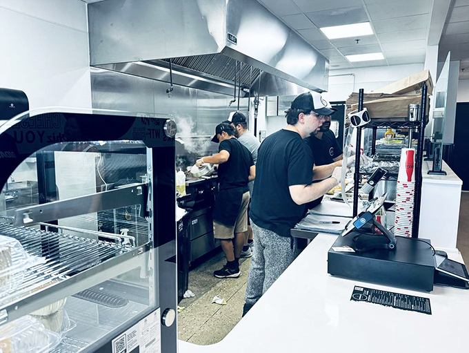 Where the magic happens. The kitchen crew works with the precision of surgeons and the creativity of artists.