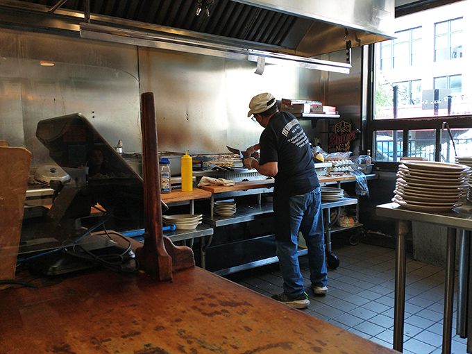 Where the magic happens. The open kitchen design means your food travels mere feet from skilled hands to hungry mouth.