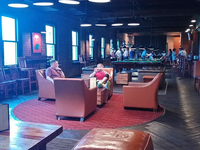 The upstairs lounge area proves billiards and comfortable seating aren't mutually exclusive. Notice that no one's looking at their phones&mdash;that's the mark of a special place.
