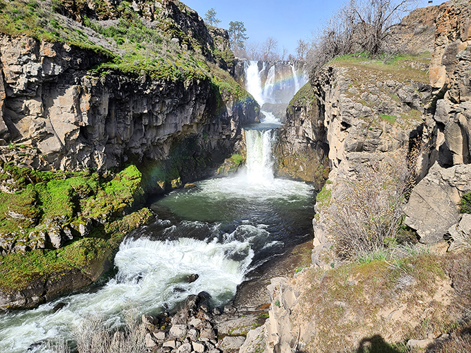 The falls don't just drop&mdash;they perform, cascading in stages like a well-choreographed aquatic dance down ancient stone.