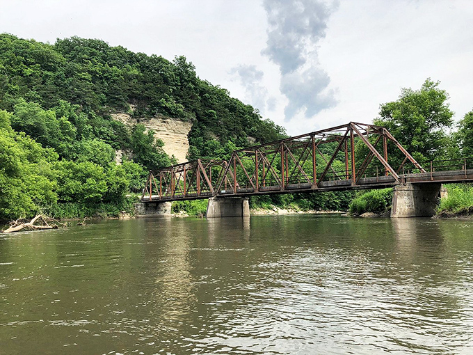 This isn't just any bridge&mdash;it's a portal between Decorah's natural beauty and human ingenuity. Engineering that enhances rather than intrudes.