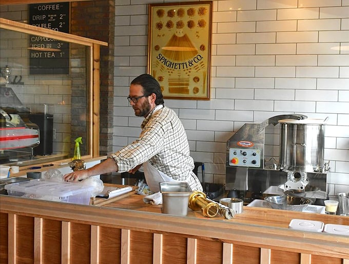 Pasta artisans at work behind the counter. There's something deeply satisfying about watching someone who's mastered their craft.