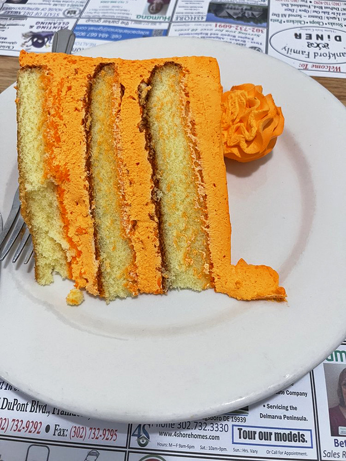 Orange creamsicle cake that transforms childhood ice cream truck memories into sophisticated layers of nostalgic bliss&mdash;no running required.