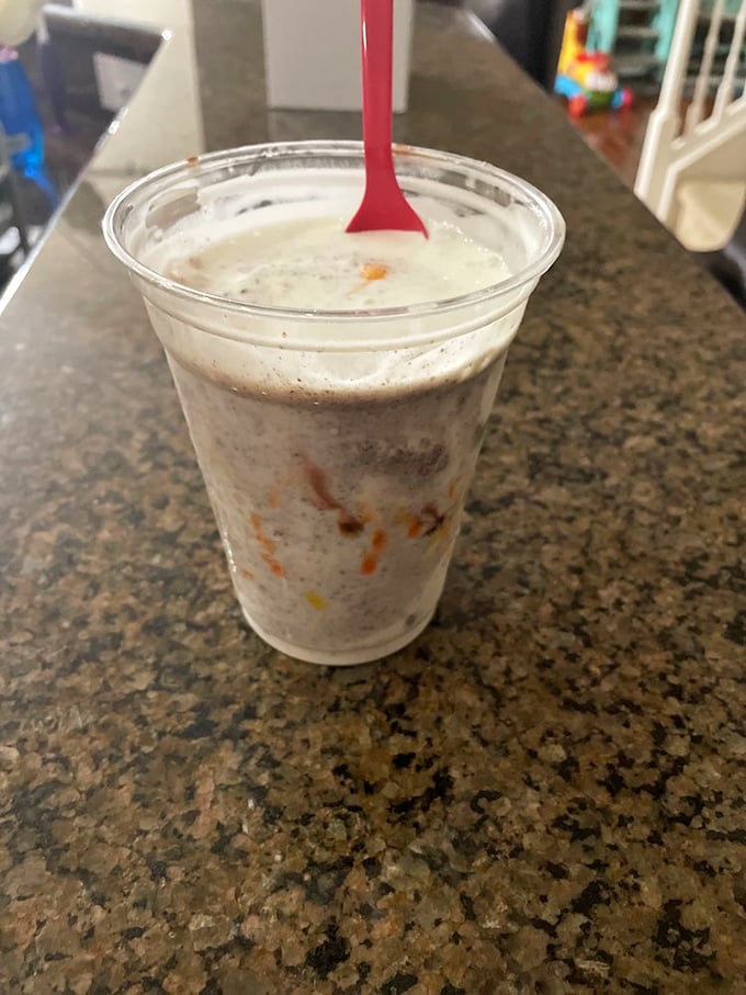 When your milkshake looks like a science experiment gone deliciously right. Those swirls of chocolate and peanut butter are hypnotic.