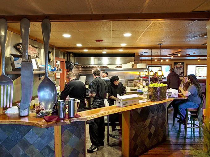 Where culinary magic happens. Those oversized utensils on the wall aren't just decoration&mdash;they're a promise of outsized flavor. 