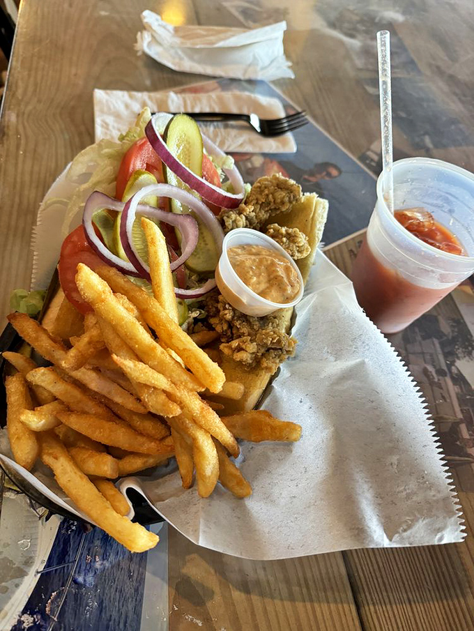 The sandwich equivalent of a Florida postcard&mdash;crispy seafood, fresh veggies, and a sauce worth bottling and taking home as a souvenir.