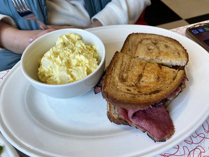 A diner interior that whispers, "Sit down, stay awhile, and forget that kale smoothies were ever invented."