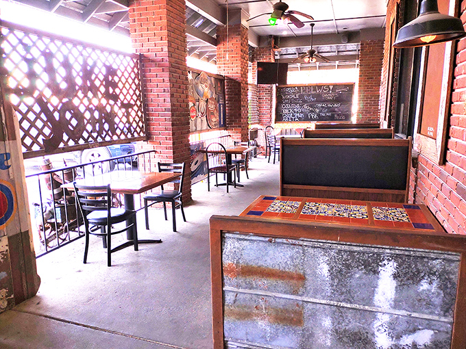 Exposed brick, wooden tables, and natural light create the perfect backdrop for serious eating in casual surroundings.