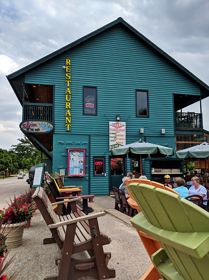 Riverside On the Root isn't just a restaurant&mdash;it's a turquoise invitation to sit awhile. Those Adirondack chairs are practically begging for your story.