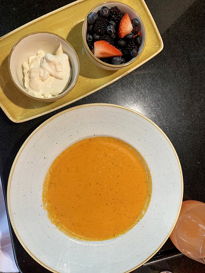 This sunshine-colored soup and fresh berry side act like the breakfast version of a spa day—comforting yet somehow virtuous.