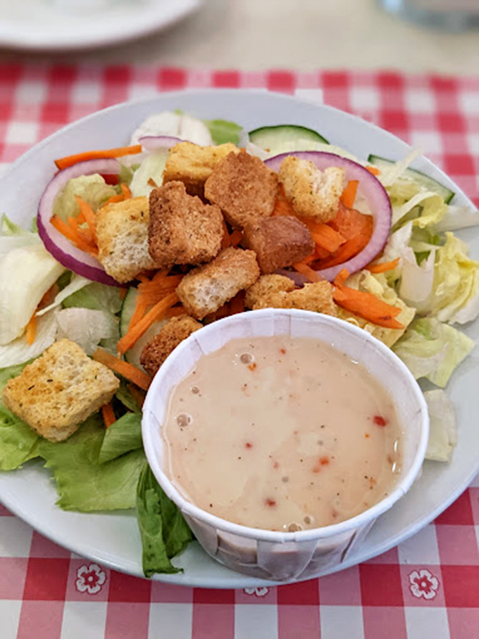A garden on a plate that somehow doesn't feel like punishment&mdash;fresh vegetables, homemade croutons, and dressing that makes virtue taste like indulgence.