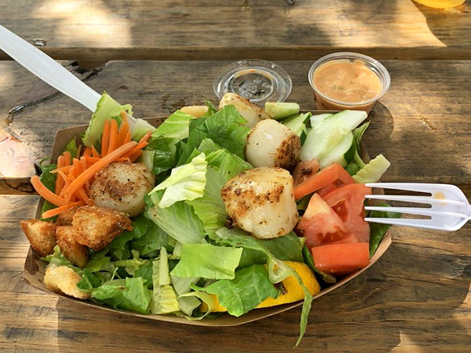 A scallop salad that proves eating greens can be a joyful experience when topped with perfectly seared treasures from the sea.