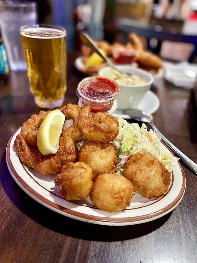 Scallops and prawns fried to golden perfection, served with the kind of coleslaw that makes you wonder why you don't eat more coleslaw in your regular life.