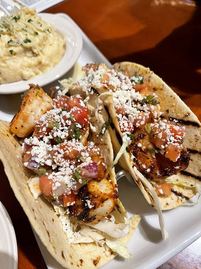 Shrimp tacos topped with enough fresh fixings to make you forget you're eating in a beach bar and not some fancy coastal cantina.