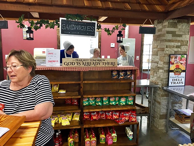 Behind every great sandwich is a team that understands the art of simplicity. Note the inspirational sign&mdash;they're feeding souls as well as bodies.