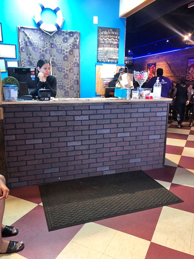 Behind this brick counter, seafood dreams come true &ndash; where the host station doubles as mission control for your oceanic adventure.