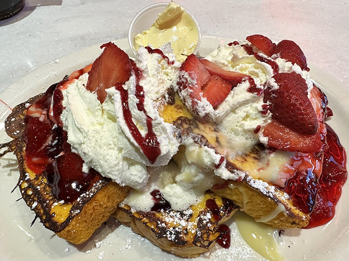 Strawberry stuffed French toast that looks like it should be the centerfold in "Breakfast Monthly" – decadent, beautiful, and worth every calorie.