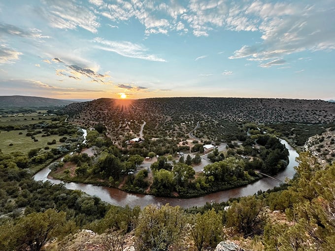 Sunset transforms the Pecos River into a ribbon of gold, wrapping around the park like nature's own gift to patient observers.