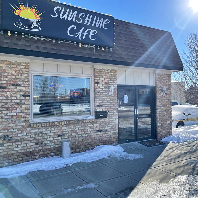 Sunshine Cafe lives up to its name, brightening even snowy Iowa days. That cleared walkway is practically rolling out the red carpet for breakfast lovers.