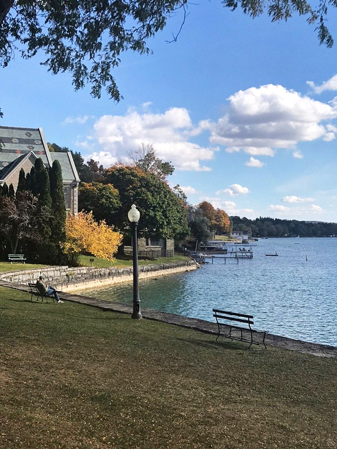 Autumn transforms Thayer Park into a painter's palette, where lakeside benches offer front-row seats to nature's most spectacular color show.