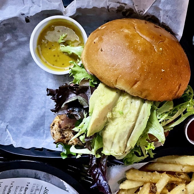 Layers of flavor stacked higher than your summer reading list&mdash;this burger demands both hands and your full attention.