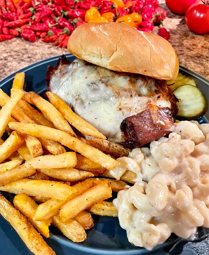 The legendary Z-Man in its natural habitat&mdash;melted cheese blanketing brisket like a dream, with fries standing guard against hunger.