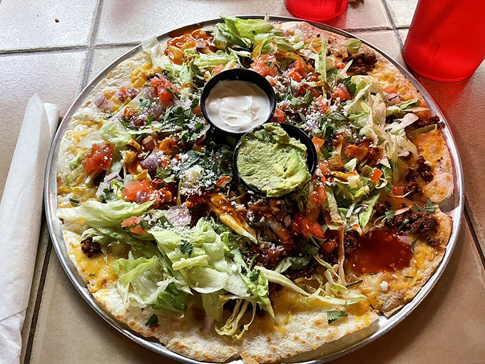 A tortilla masterpiece that's part salad, part nacho, and entirely worth the drive through Apache Trail's twists and turns.