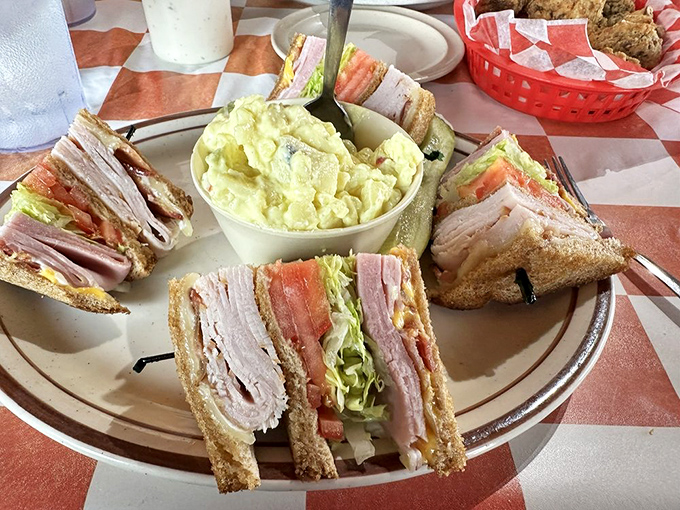 This club sandwich isn't playing around&mdash;it's a skyscraper of smoked turkey, bacon, and fresh veggies that requires a game plan to eat.