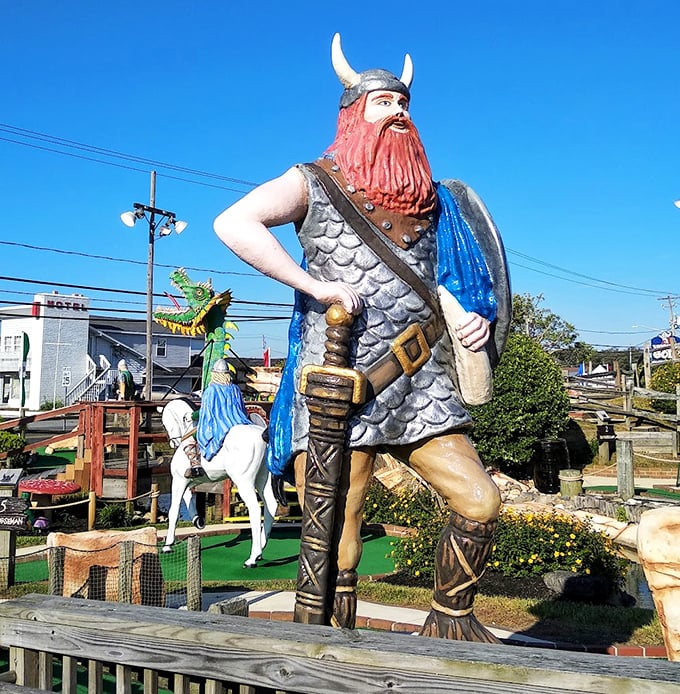 Standing tall and proud, this Viking warrior statue watches over his domain with the confidence of someone who's never had to parallel park.