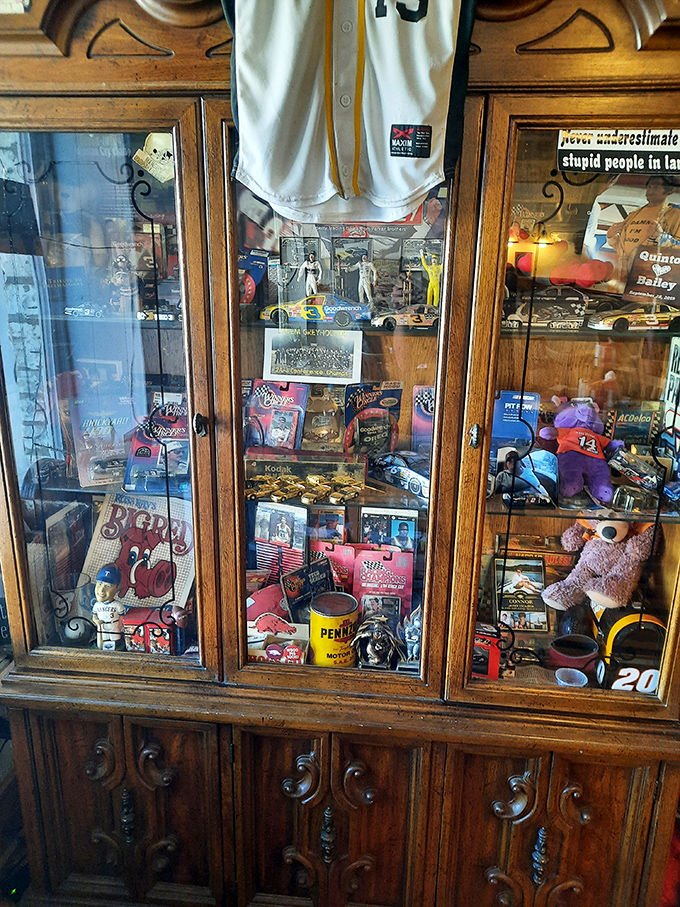 This vintage collection cabinet tells more stories than your grandpa after his third bourbon. Each trinket represents a piece of Salem's soul.