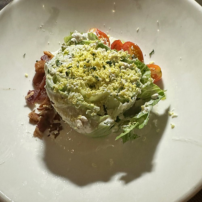 A wedge salad that refuses to apologize for being mostly lettuce. The toppings transform it into an adventure worth embarking on.