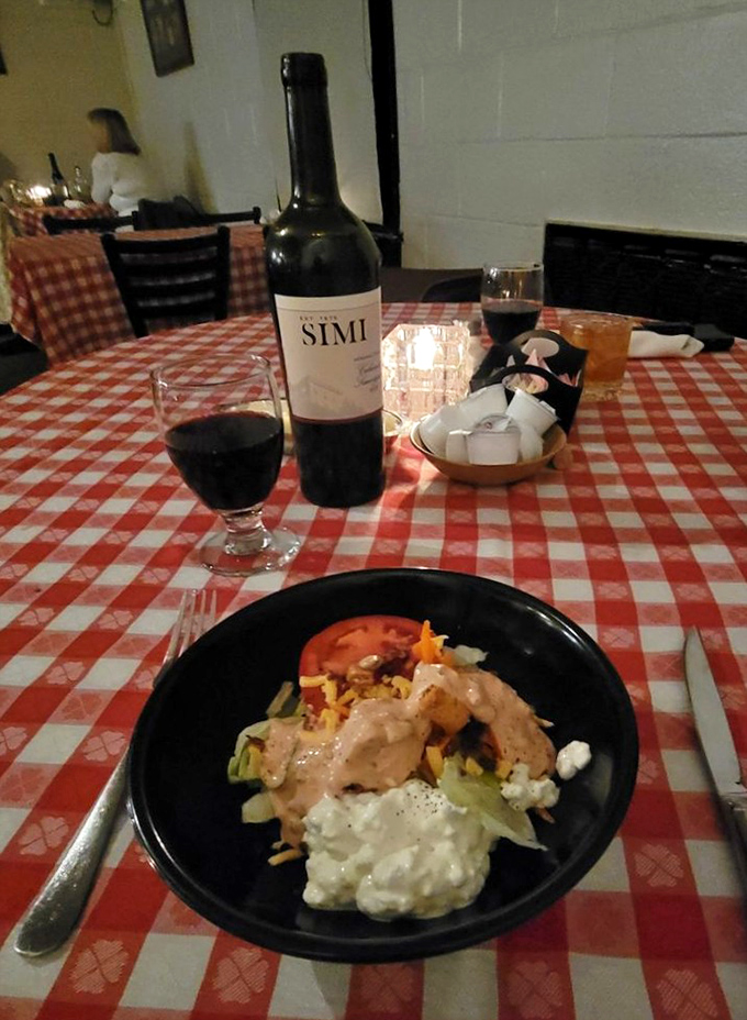 Even fancy wine knows to dress down at Beefmastor Inn. Red wine and red-checkered tablecloths&mdash;perfect simplicity.